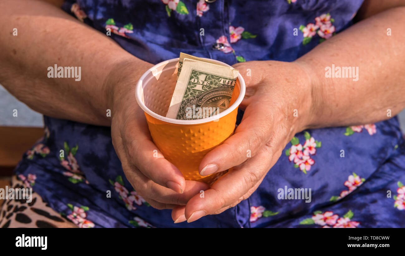Woman begging for alms hi-res stock photography and images - Alamy