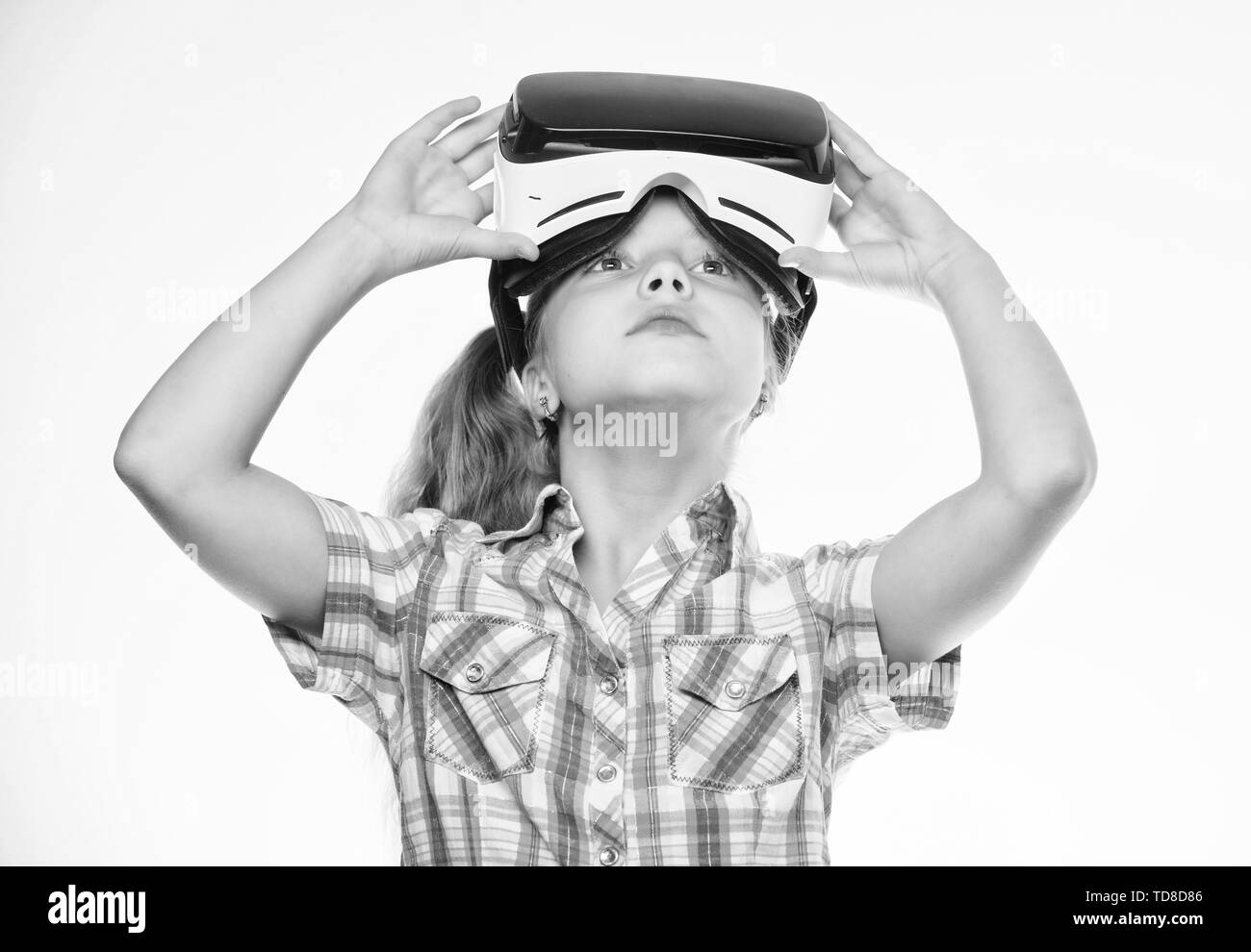 Happy kid use modern technology virtual reality. Get virtual experience ...
