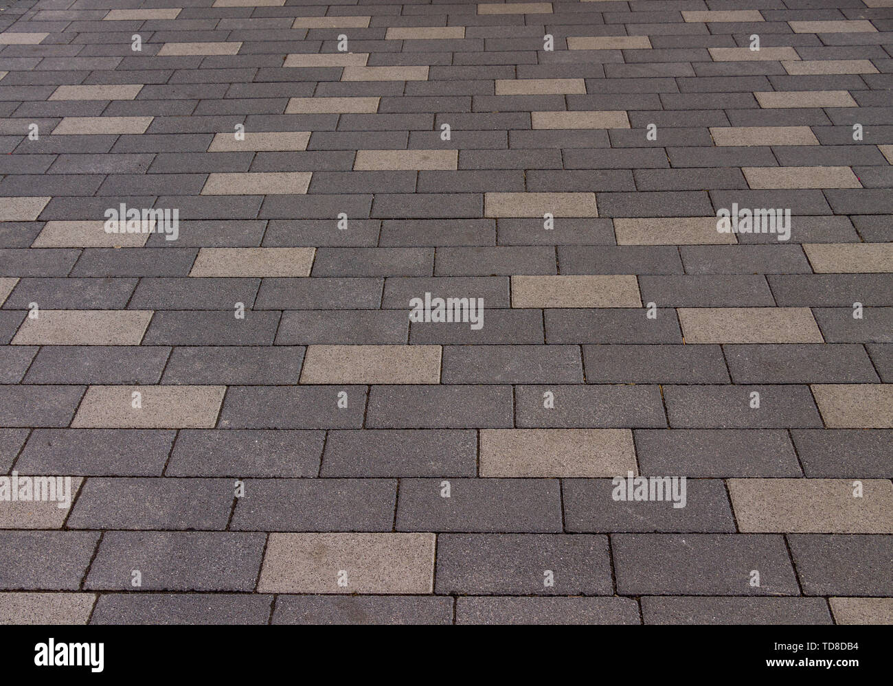 Block pavement or sidewalk in grey and white geometric shapes Stock ...