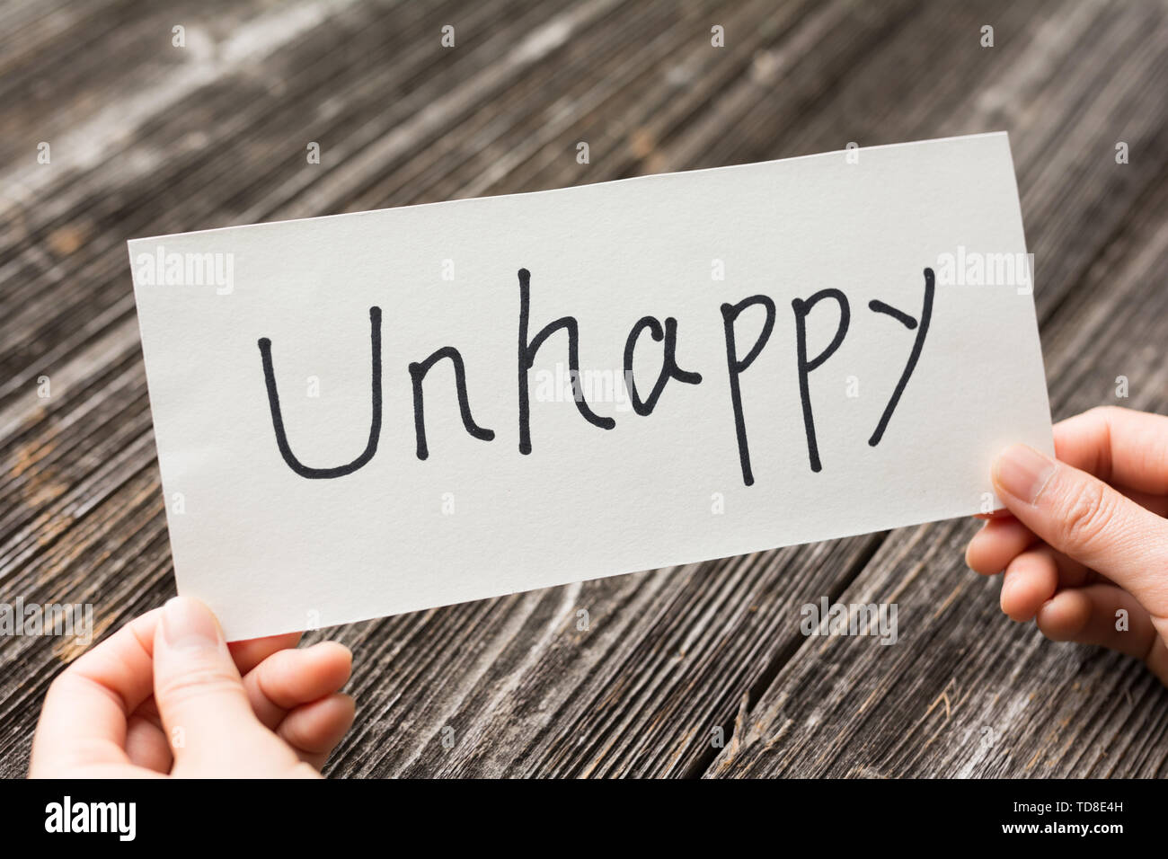 Reynolds card with text on old wood plate Stock Photo - Alamy