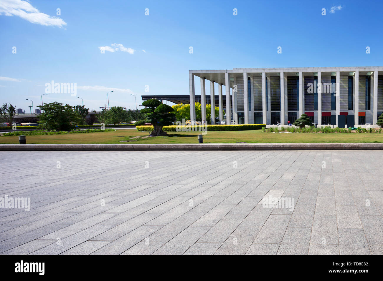 long empty footpath in modern city square with skyline Stock Photo - Alamy