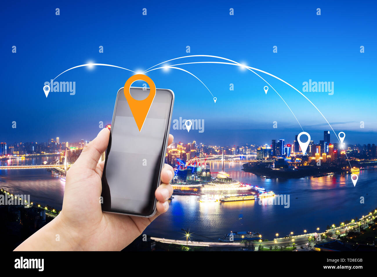 mobile phone with cityscape of modern intelligence city near riv Stock ...