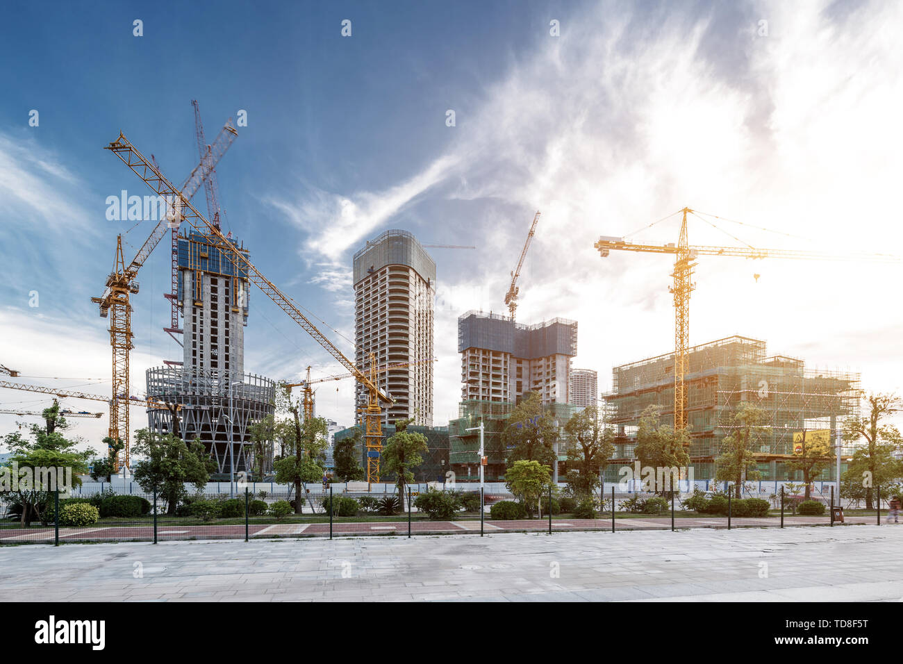 construction site close to pavement under sunshine Stock Photo - Alamy