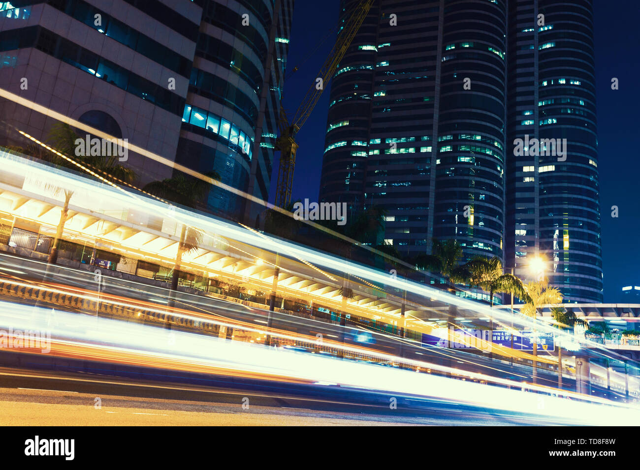 traffic light trails in modern city at night Stock Photo - Alamy