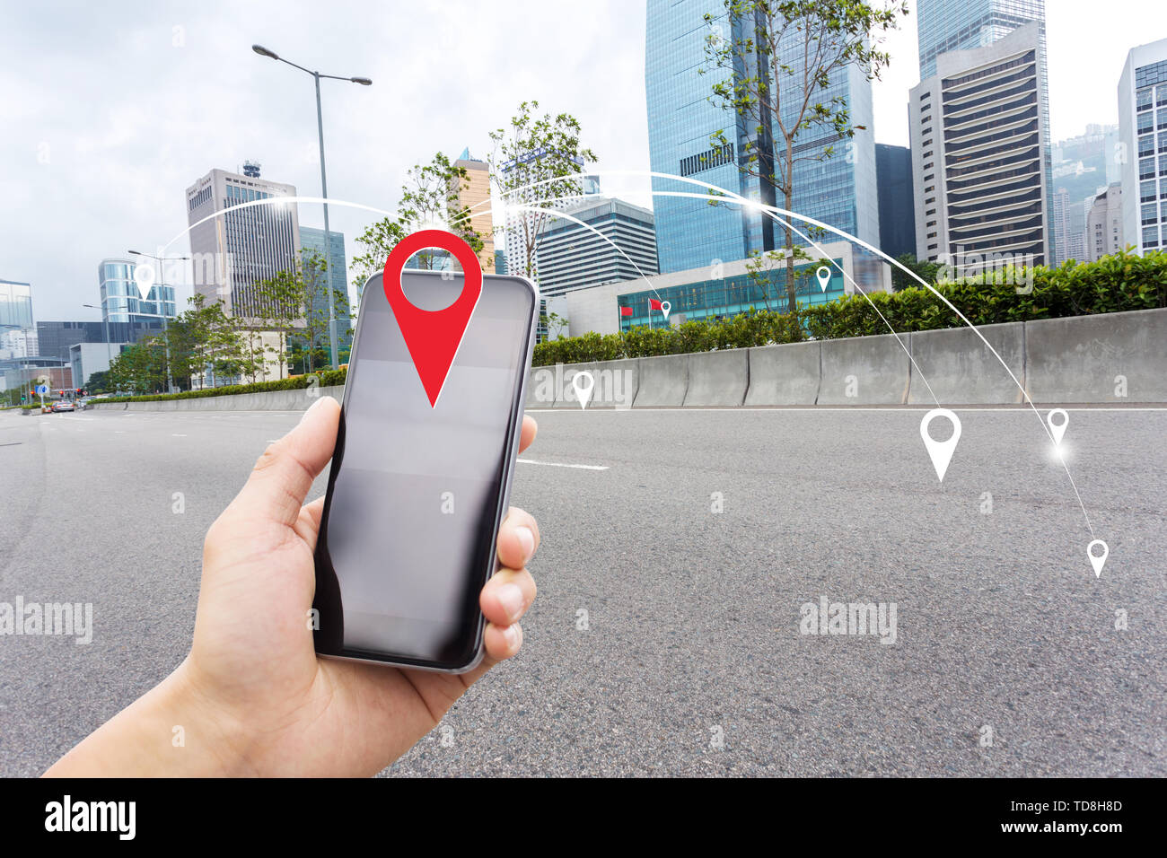 mobile phone with modern intelligence buildings near road Stock Photo ...