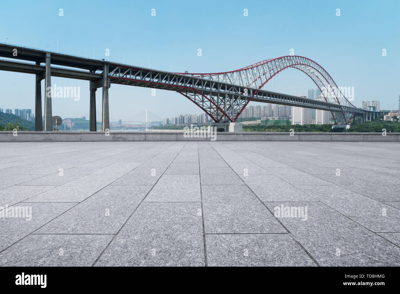 empty floor with steel bridge in modern city Stock Photo - Alamy