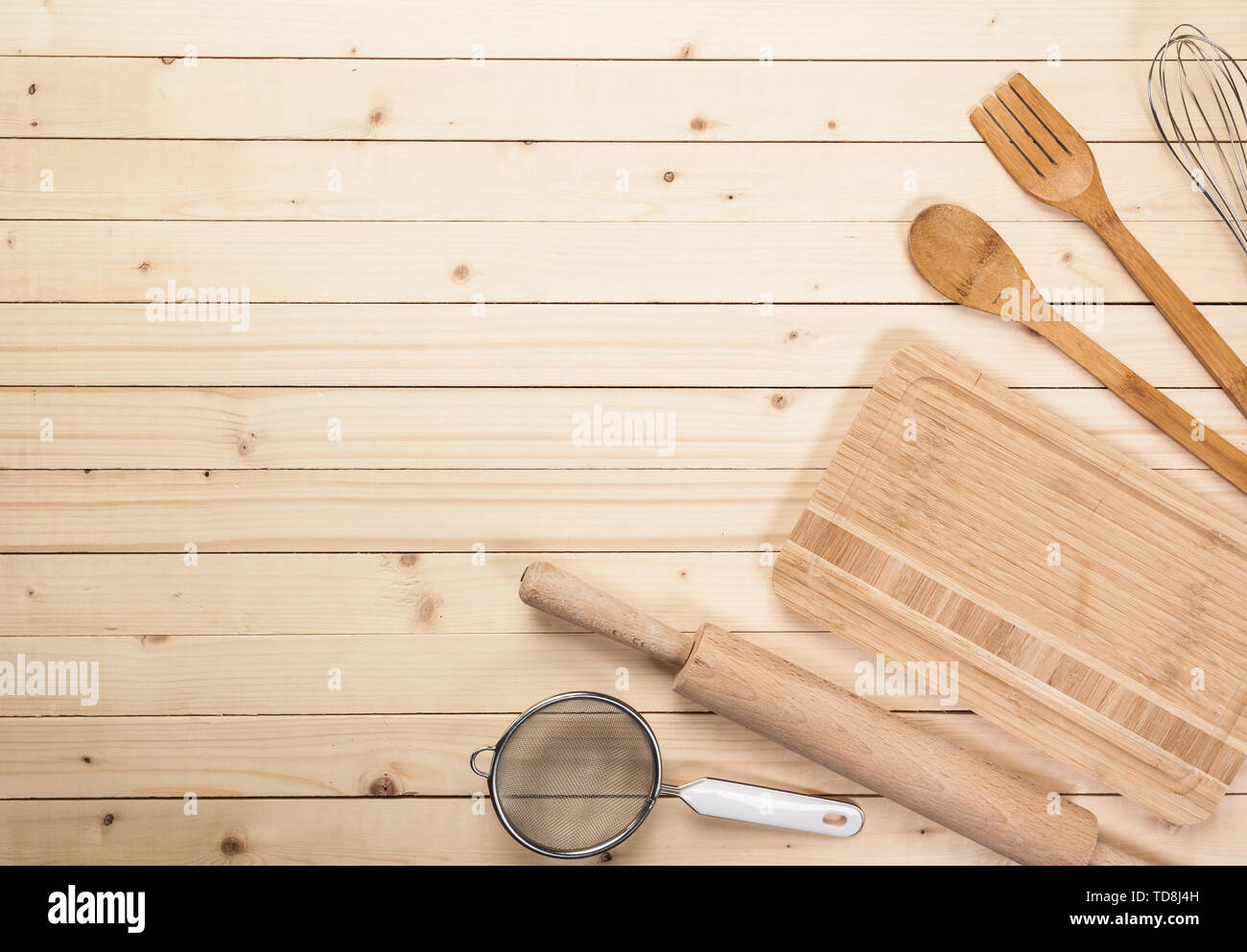 Various wooden kitchen utensils on table top view Stock Photo - Alamy