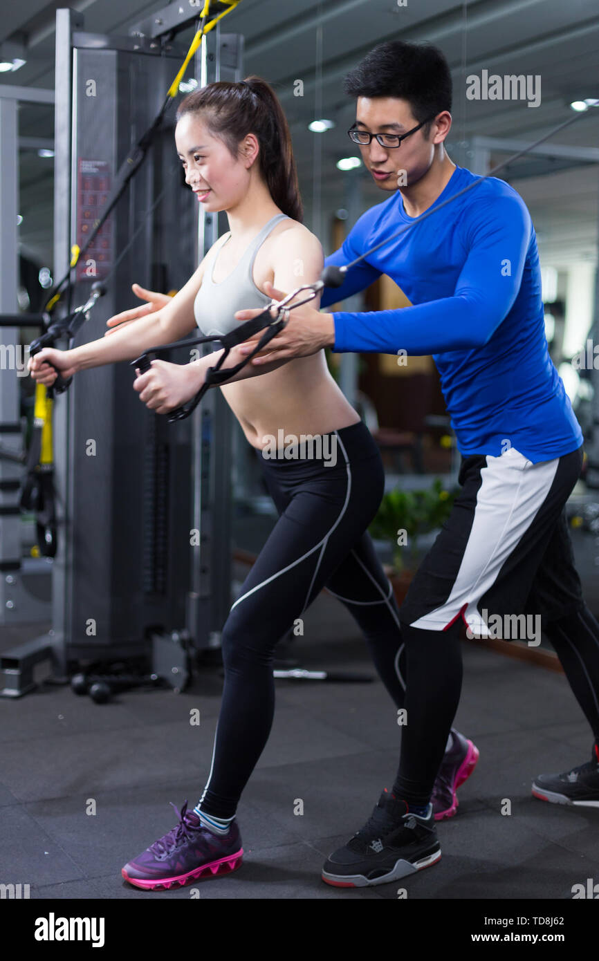 young asian people working out in modern gym Stock Photo - Alamy