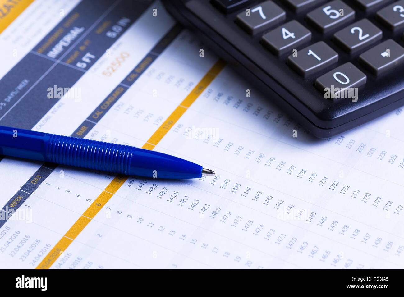 Graphs and Calculator Stock Photo - Alamy