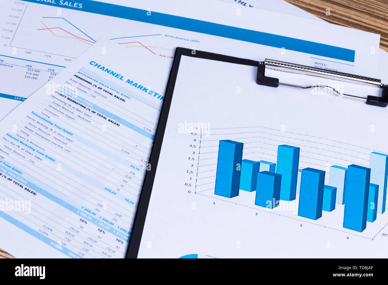 Financial paper charts and graphs on the table Stock Photo - Alamy