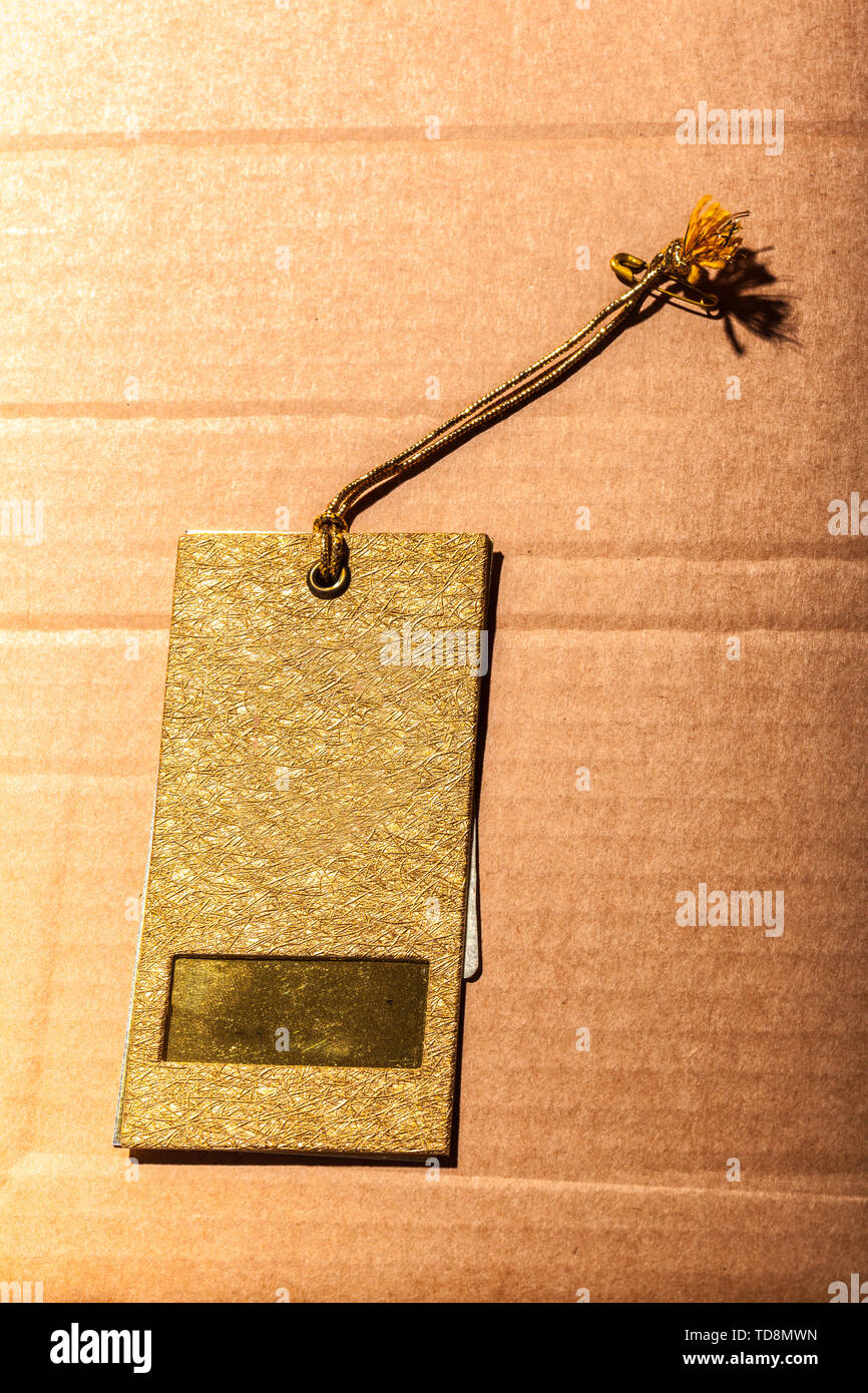 price tag label on wooden background Stock Photo - Alamy