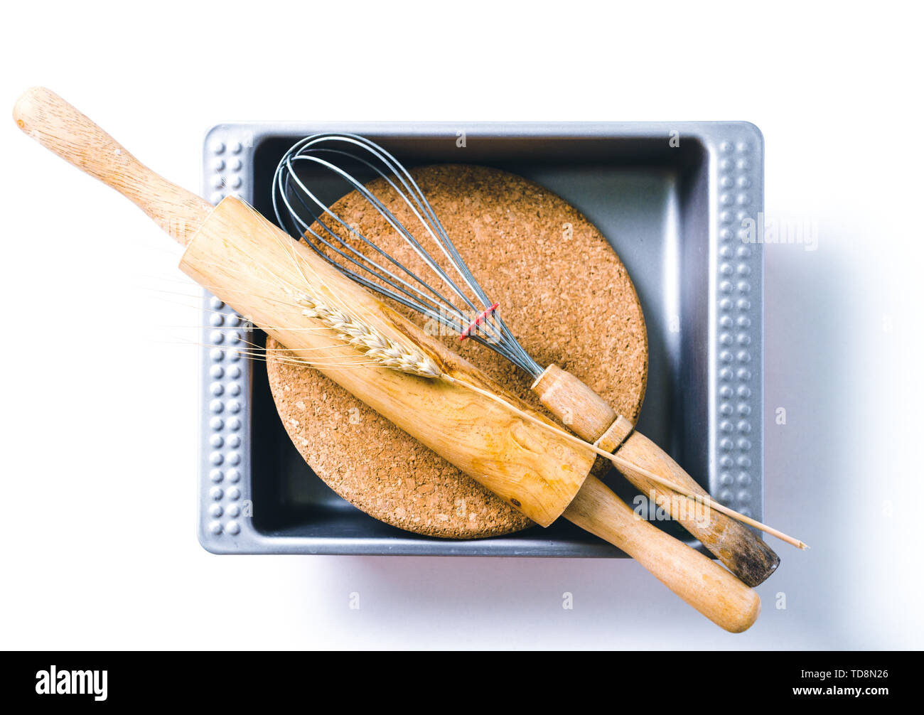 Stacked cooking equipment isolated on white Stock Photo - Alamy