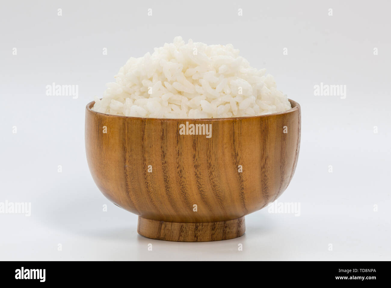 Rice on a white background Stock Photo - Alamy