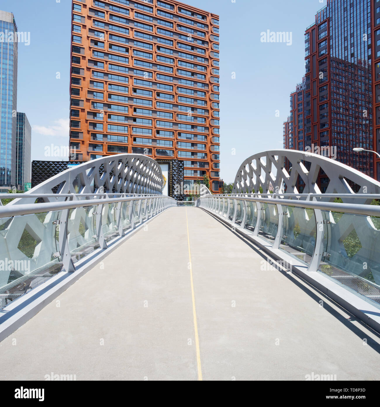footbridge and office building in modern city Stock Photo - Alamy