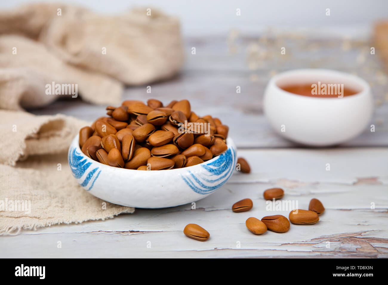 Open pine nuts Stock Photo - Alamy