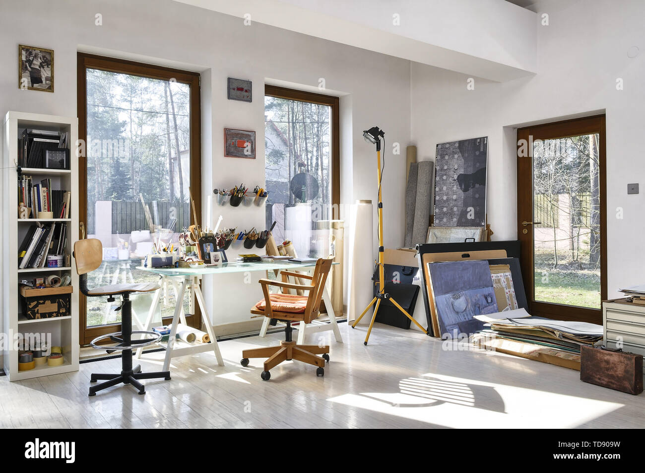 Work table and artwork in progress in spacious studio work room UK ...