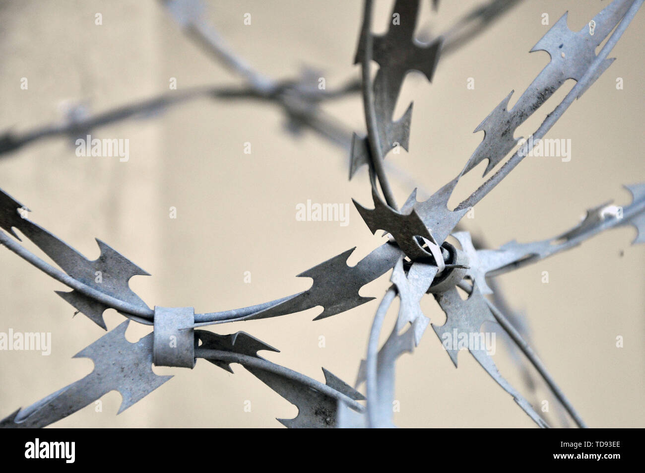 Wire fence with barbed wire. Mode object. Texture Stock Photo - Alamy