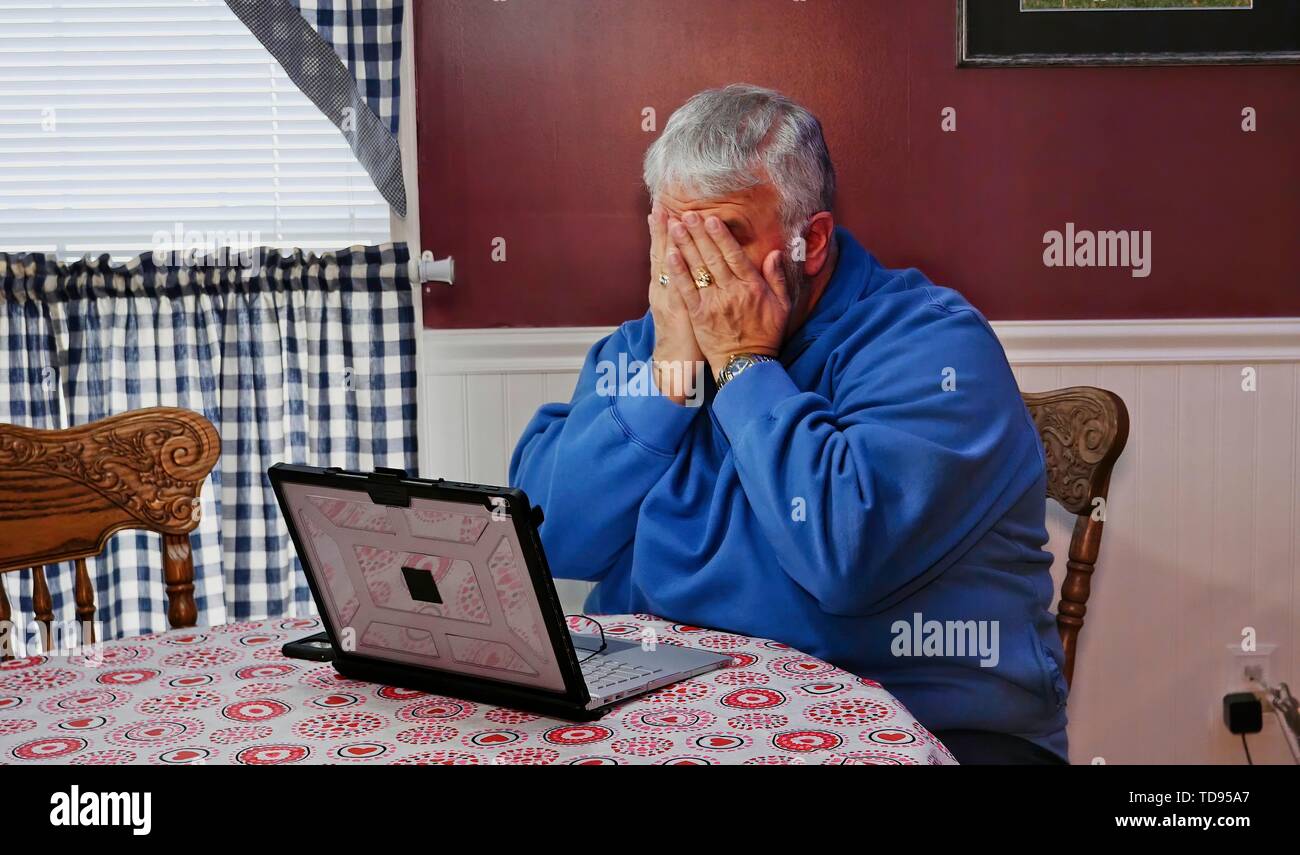 Senior Citizen Upset and Mad at Using a Computer and Technology Stock ...