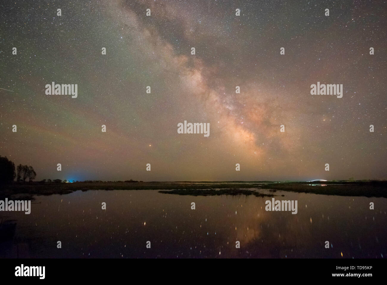 Galaxy in Xingkai Lake. Galaxy arch bridge, galactic on the lake, glow ...