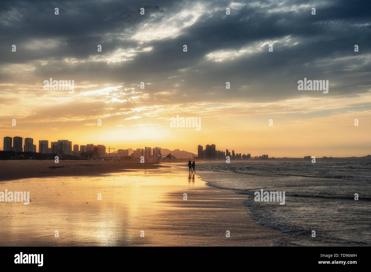 Sunset at Yantai Golden Beach Stock Photo - Alamy