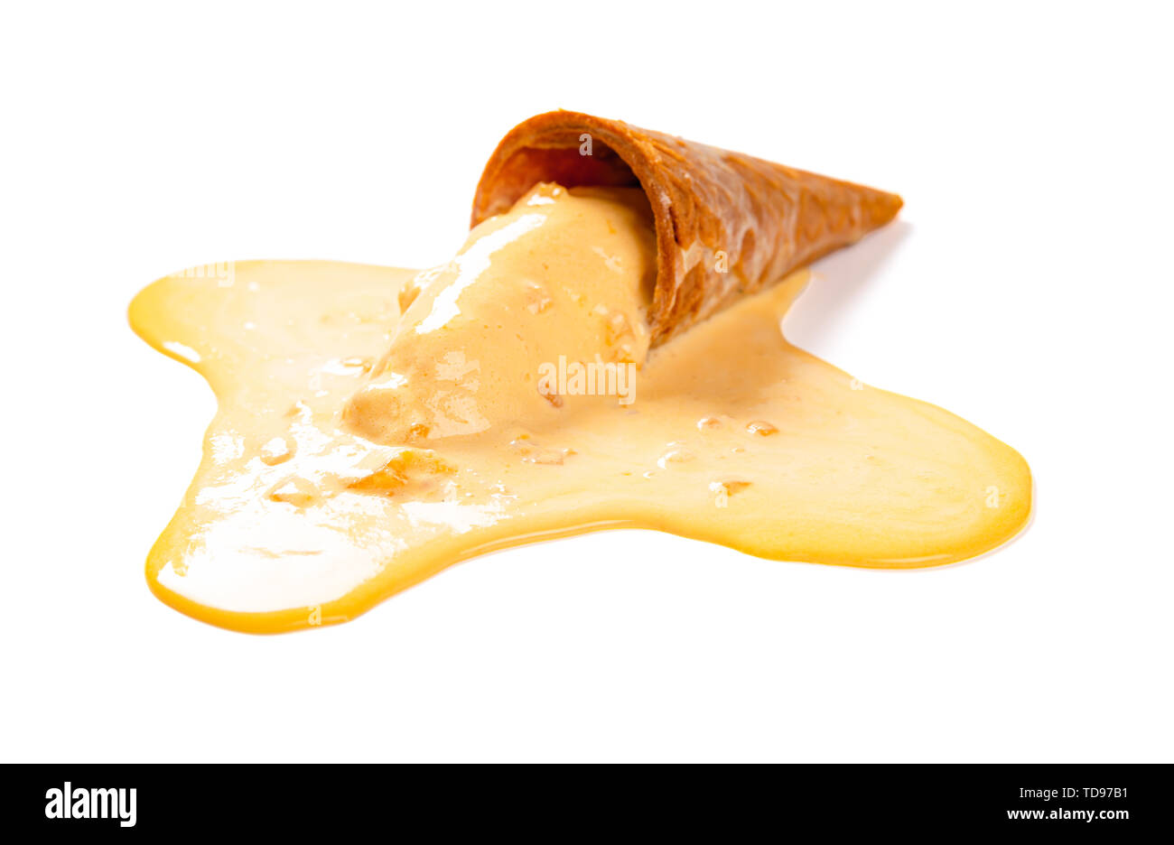 side view mango flavor ice cream cone in a melting process on white ...