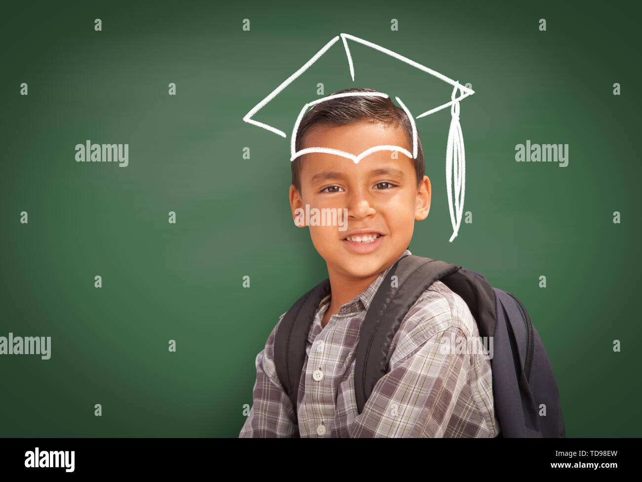 Boy student wearing graduation cap hi-res stock photography and images ...