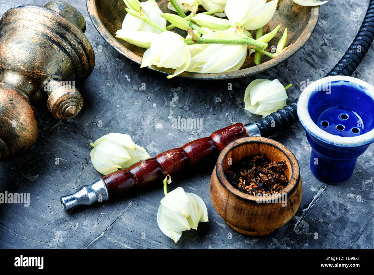 Smoking hookah with floral tobacco flavor.East kalian.Tobacco pipe and ...
