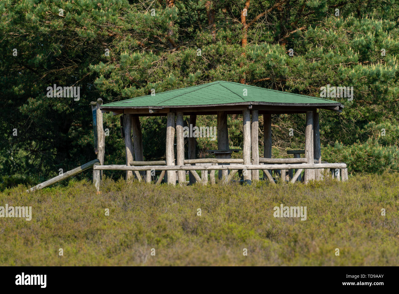 round barbecue pavilion with green roof raised on a mound Stock Photo ...