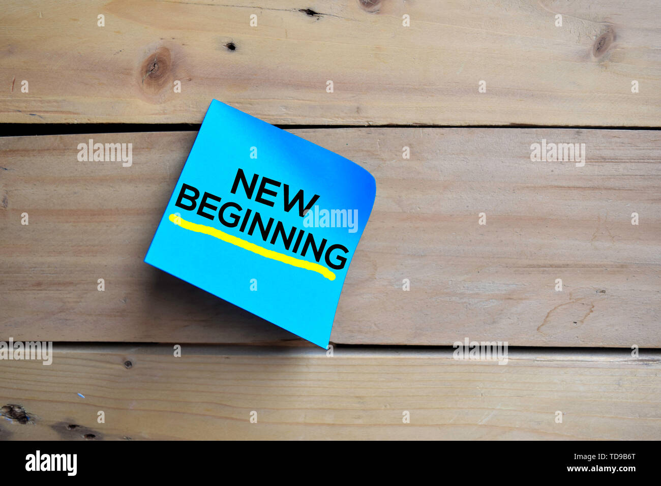 New Beginning text on sticky notes with wooden background Stock Photo ...