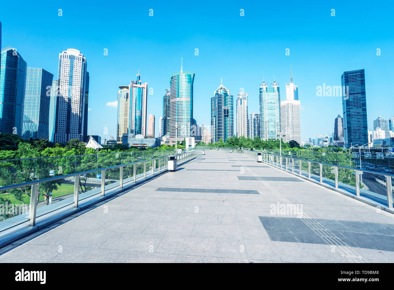modern office buildings in shanghai from empty footpath Stock Photo - Alamy