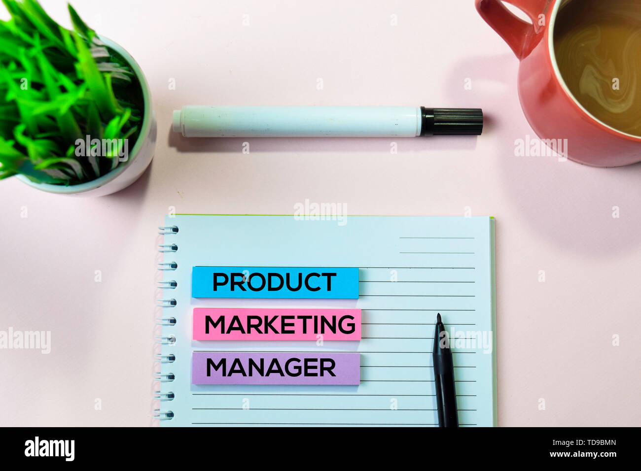 Product Marketing Manager text on sticky notes with office desk concept ...