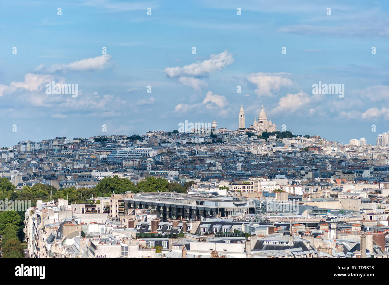 Paris city complex under the blue sky Stock Photo - Alamy