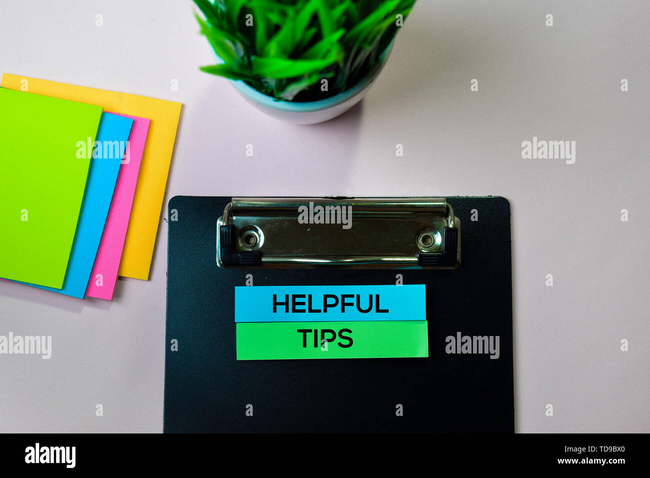 Helpful Tips text on sticky notes with office desk concept Stock Photo ...