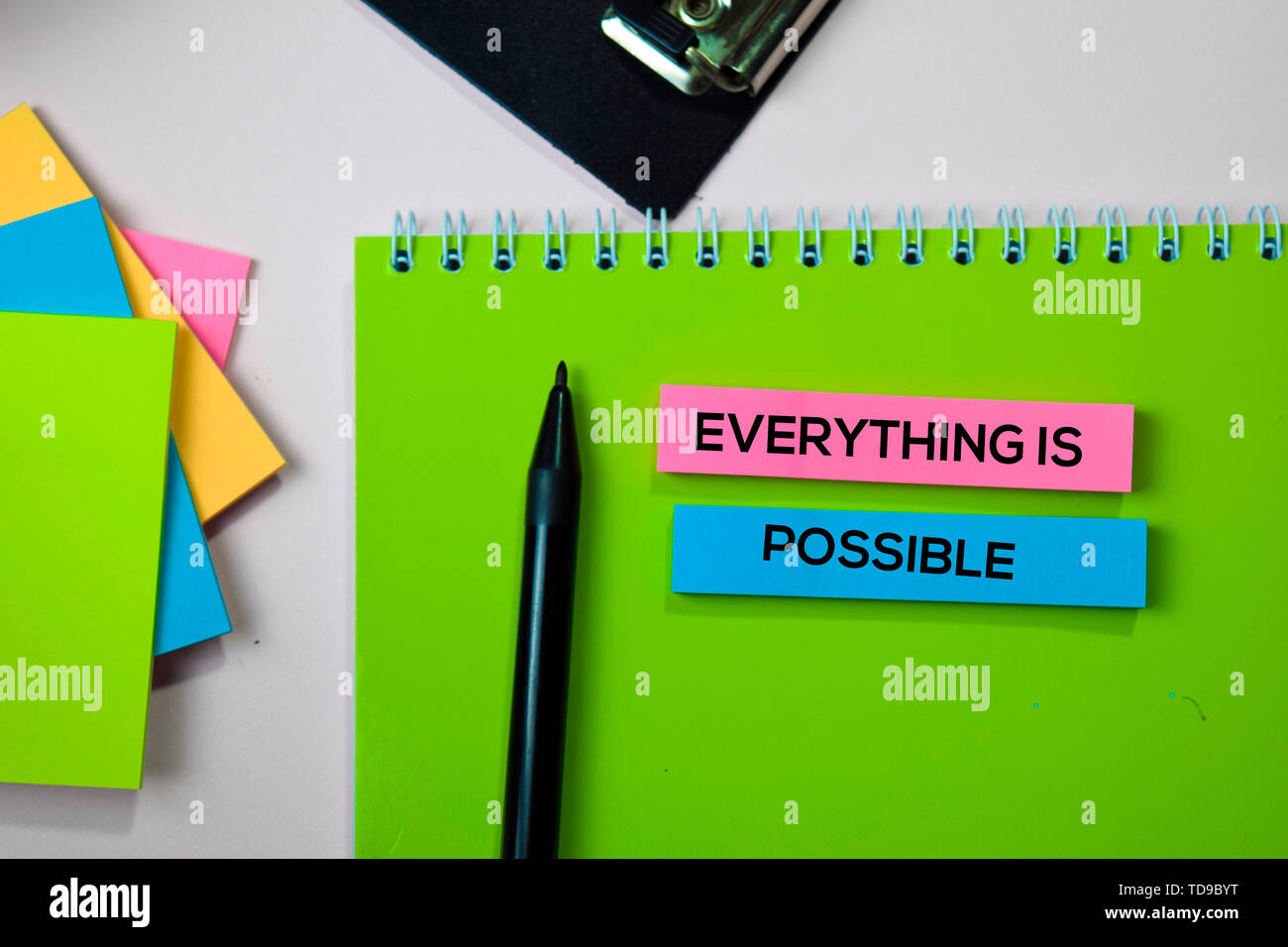Everything is Possible text on sticky notes with office desk concept ...