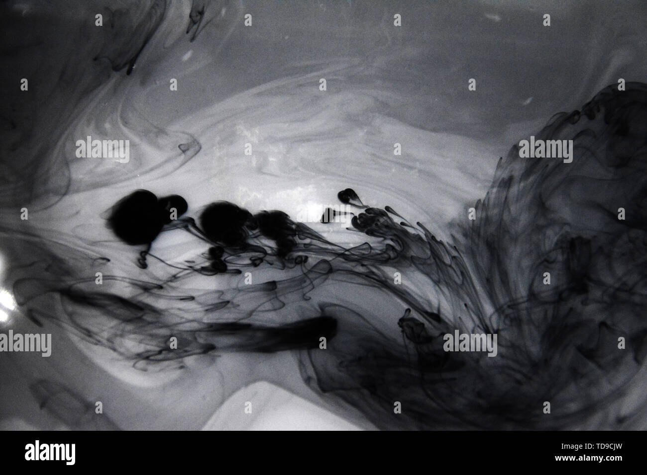 Ink background, ink flowing in water Stock Photo - Alamy