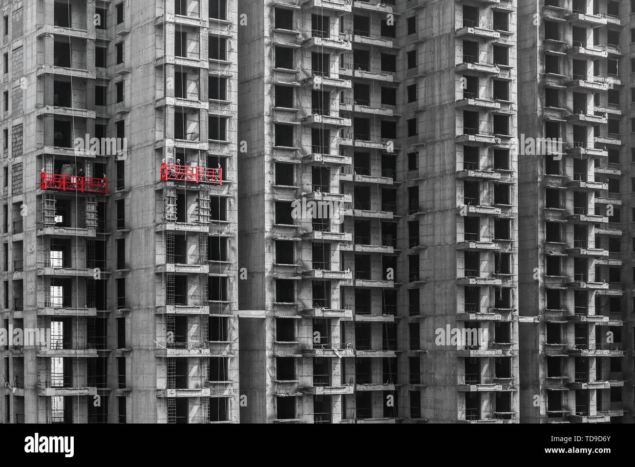 Construction workers are working at high altitude Stock Photo - Alamy