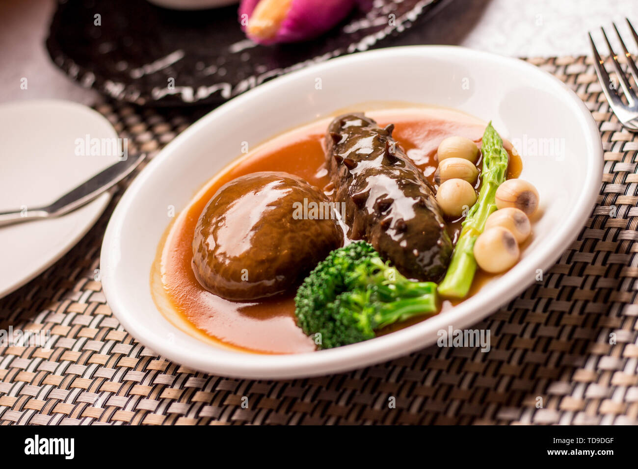 Nutrition and health food abalone sea cucumber Stock Photo - Alamy