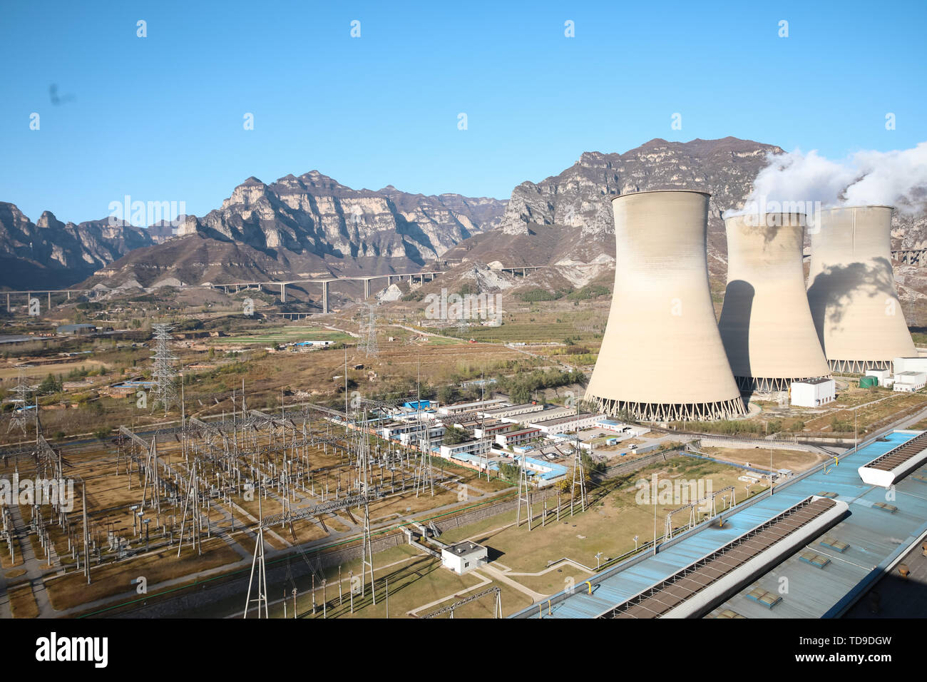 Power plant pipelines and substations Stock Photo - Alamy