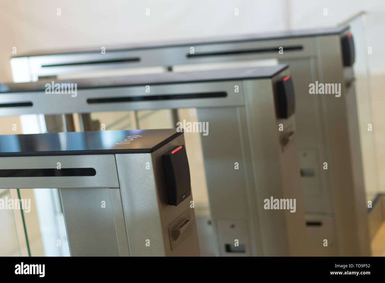 Automatic security turnstiles with card reader in a corporate office ...