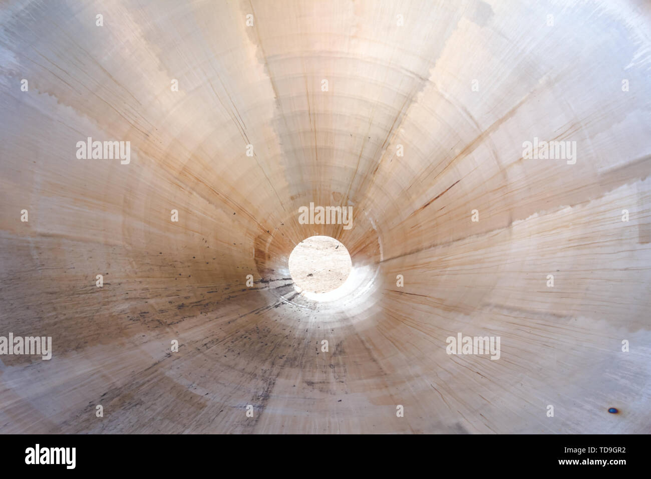 Perspective view inside of huge silo, reservoir made of stainless steel ...