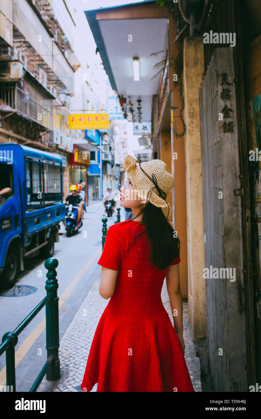 Red dress to Macau Stock Photo - Alamy