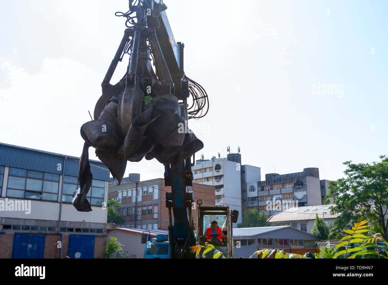 View on machine, loader manipulator with hydraulic grappling claw until ...