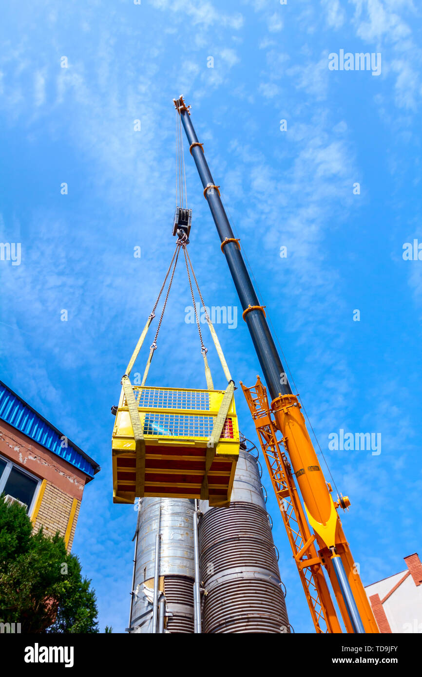 Lifting work basket with gas welding equipment, full cylinder of ...