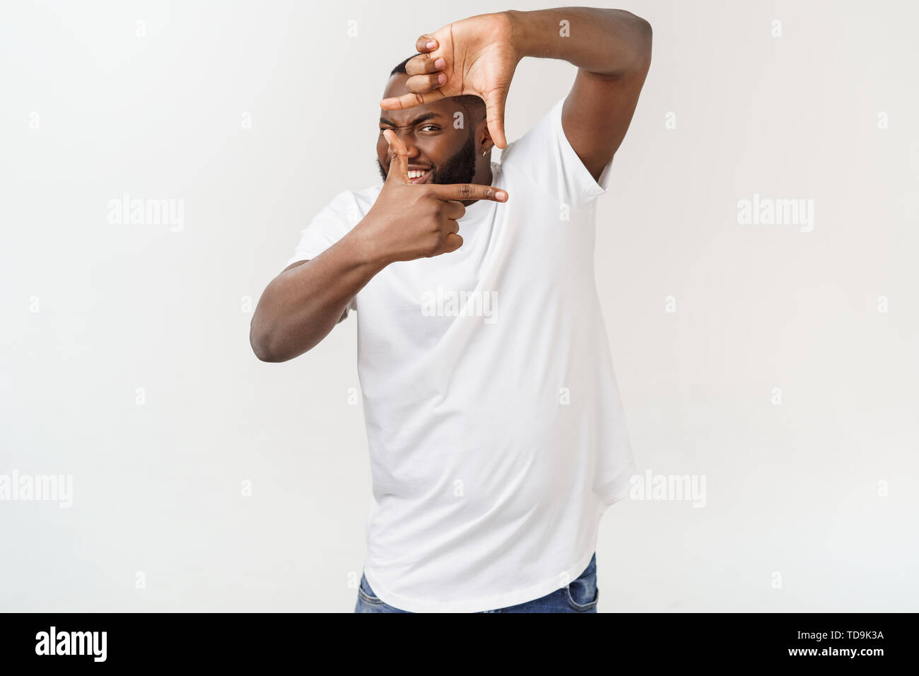 African man making frame sign with his hands isolate over white ...