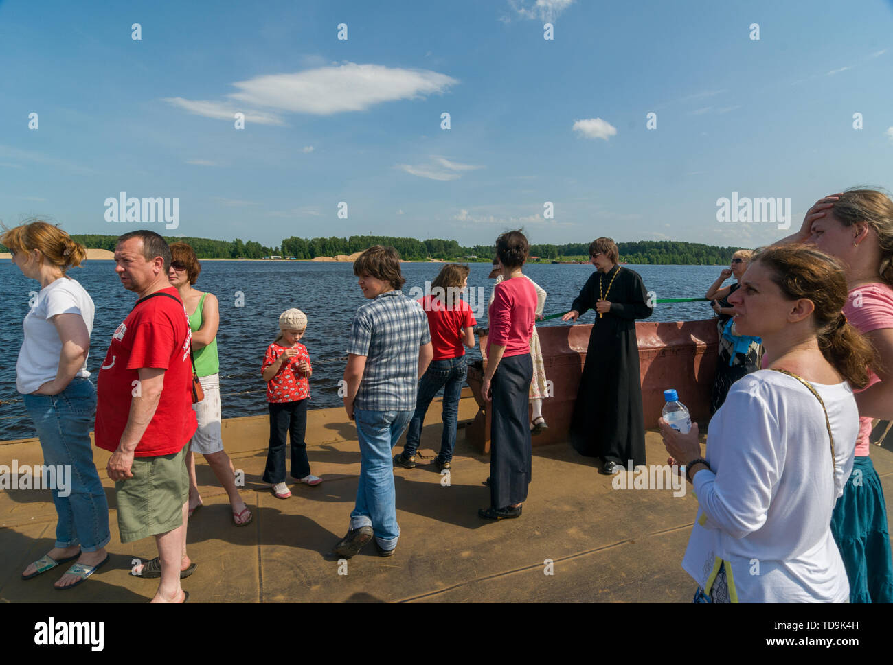 People on a ferry at Volga Stock Photo - Alamy
