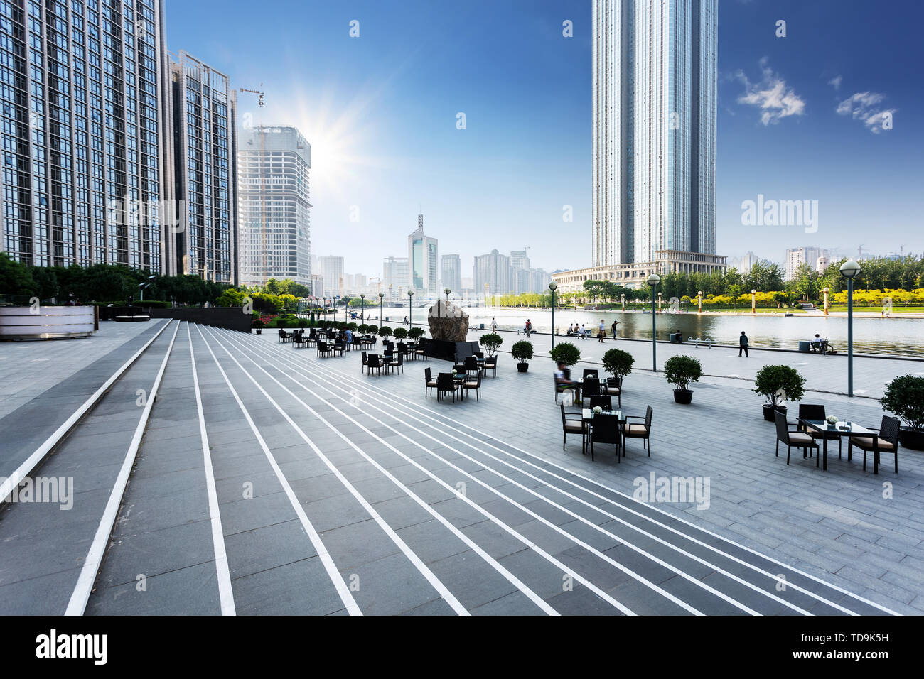 Modern buildings and public square with seats Stock Photo - Alamy