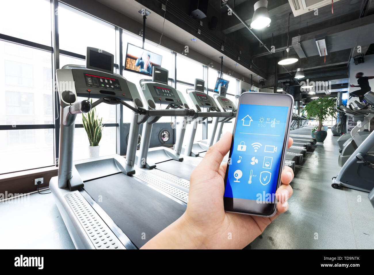 smart phone with smart home with modern gym Stock Photo - Alamy