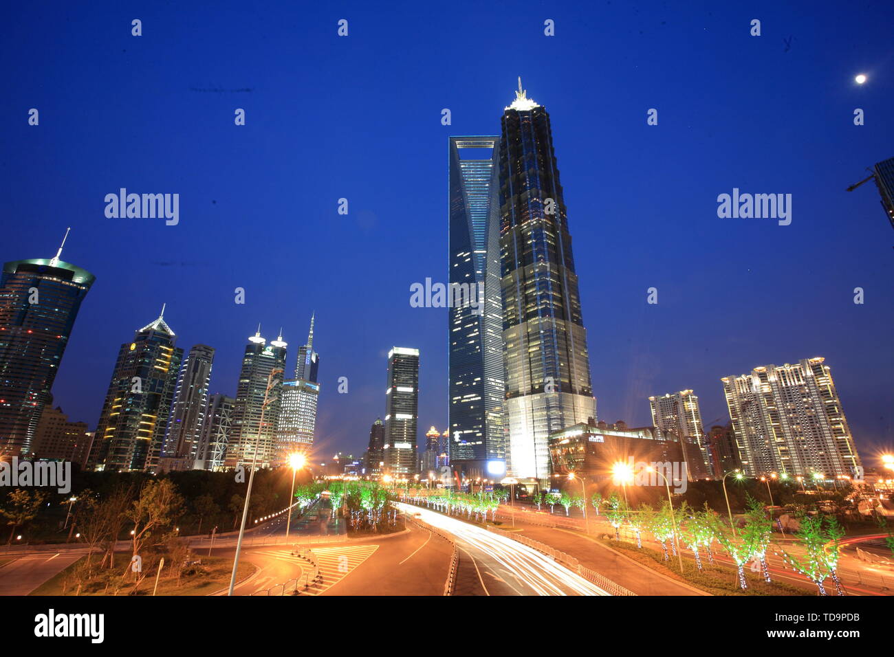 the light trails on the modern building background in shanghai c Stock ...