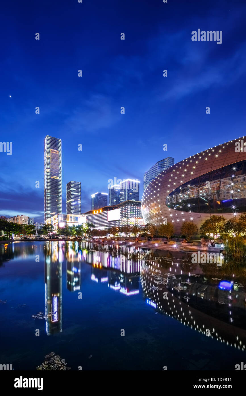 Illumintaed modern landmark and skyline at riverbank Stock Photo - Alamy
