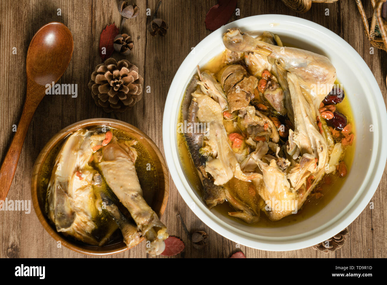 Chicken soup with wood pattern background Stock Photo - Alamy